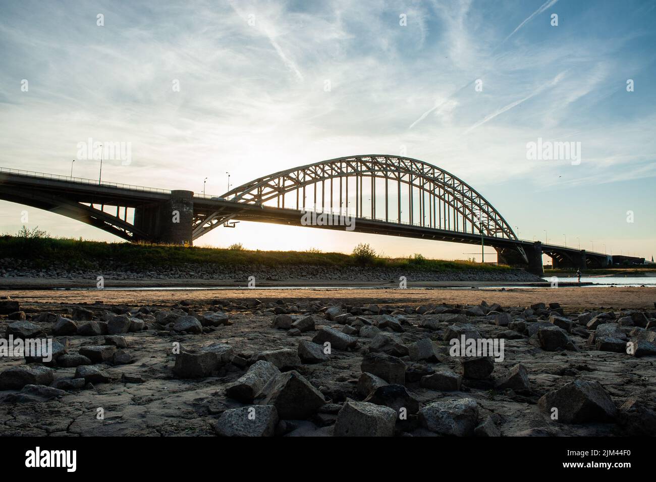 The dry ground seen along the Waal river. Due to the ongoing drought ...