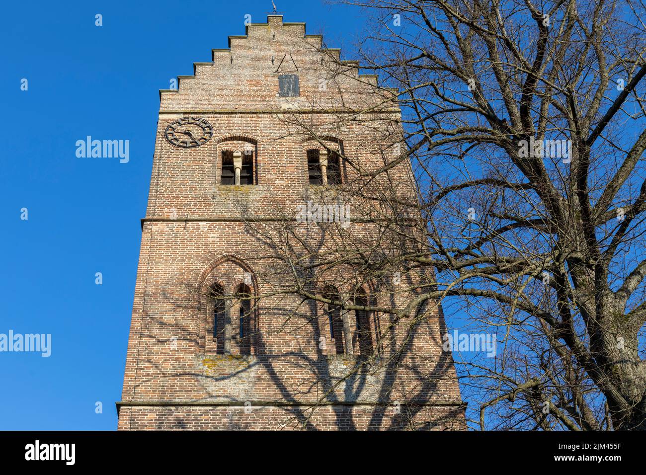 Top part of church tower Christophorus kerk in Geesteren town seen from ...