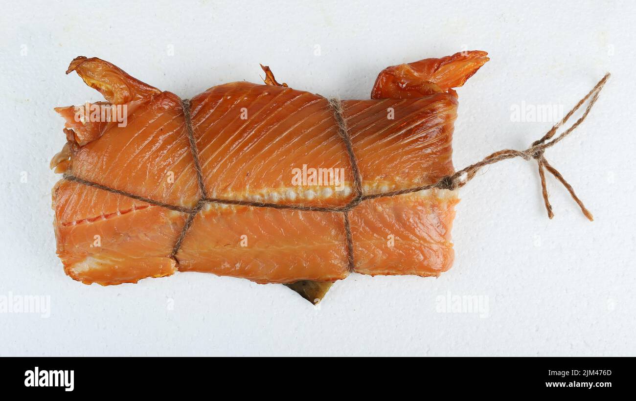 A closeup of a delicious smoked fish fillet on a white background Stock ...