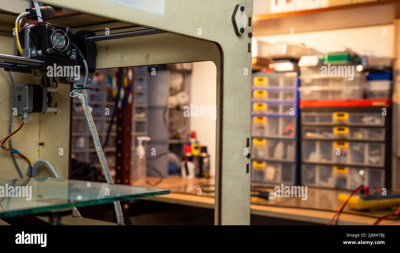 A selective of a 3D printer in a workshop Stock Photo - Alamy