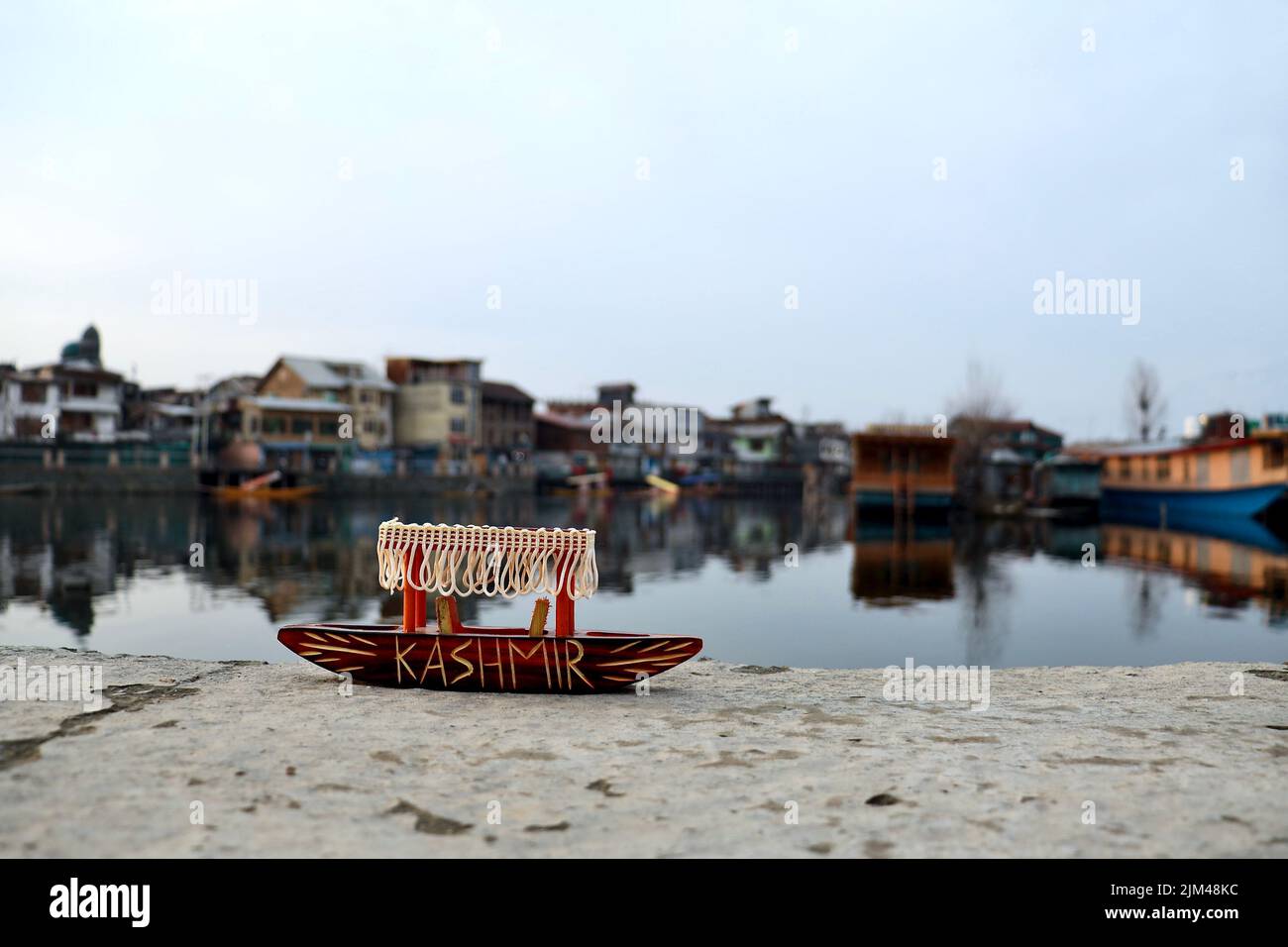 A miniature wooden model of the Shikara boat with the union territory's ...