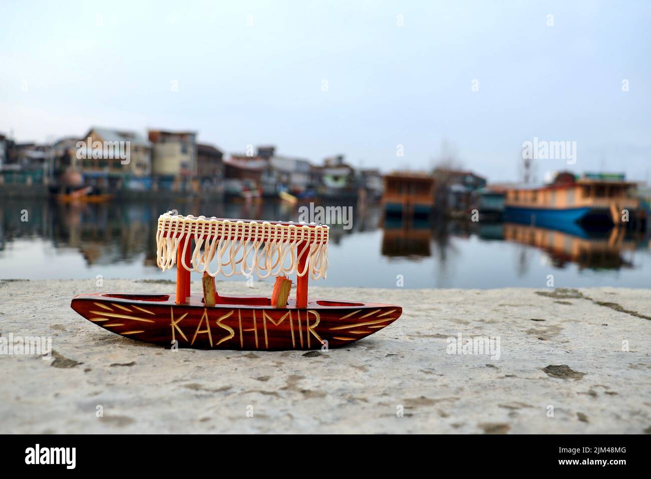 A miniature wooden model of the Shikara boat with the union territory's ...