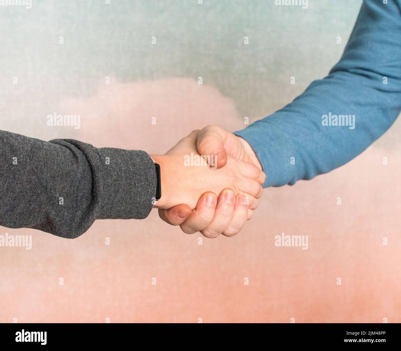 A close up of a handshake Stock Photo - Alamy