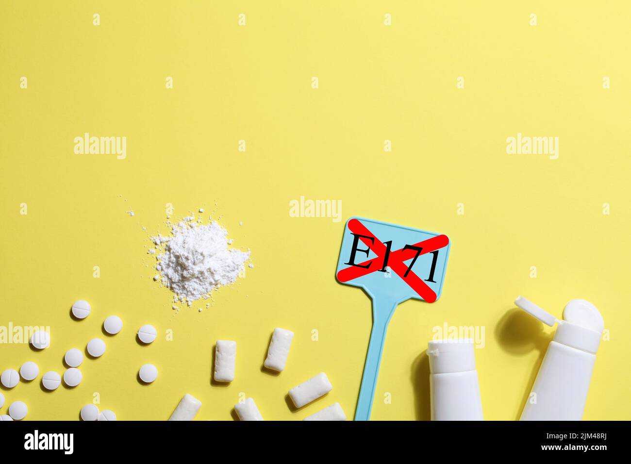 Titanium dioxide, E171, dangerous additive concept. gum, pills ...