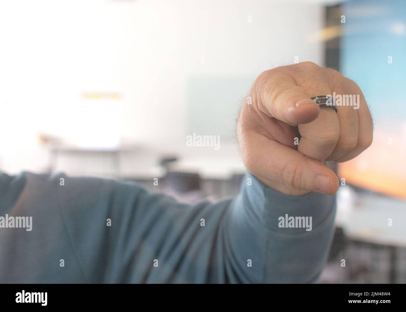 A close up of a pointing finger towards you Stock Photo - Alamy