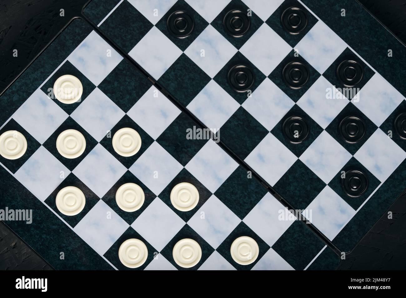 Checkers board with chips black background, checkers logical board game ...