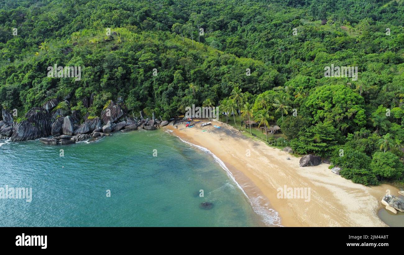 An aerial view of the forested area and sandy beach in Brazil Stock ...