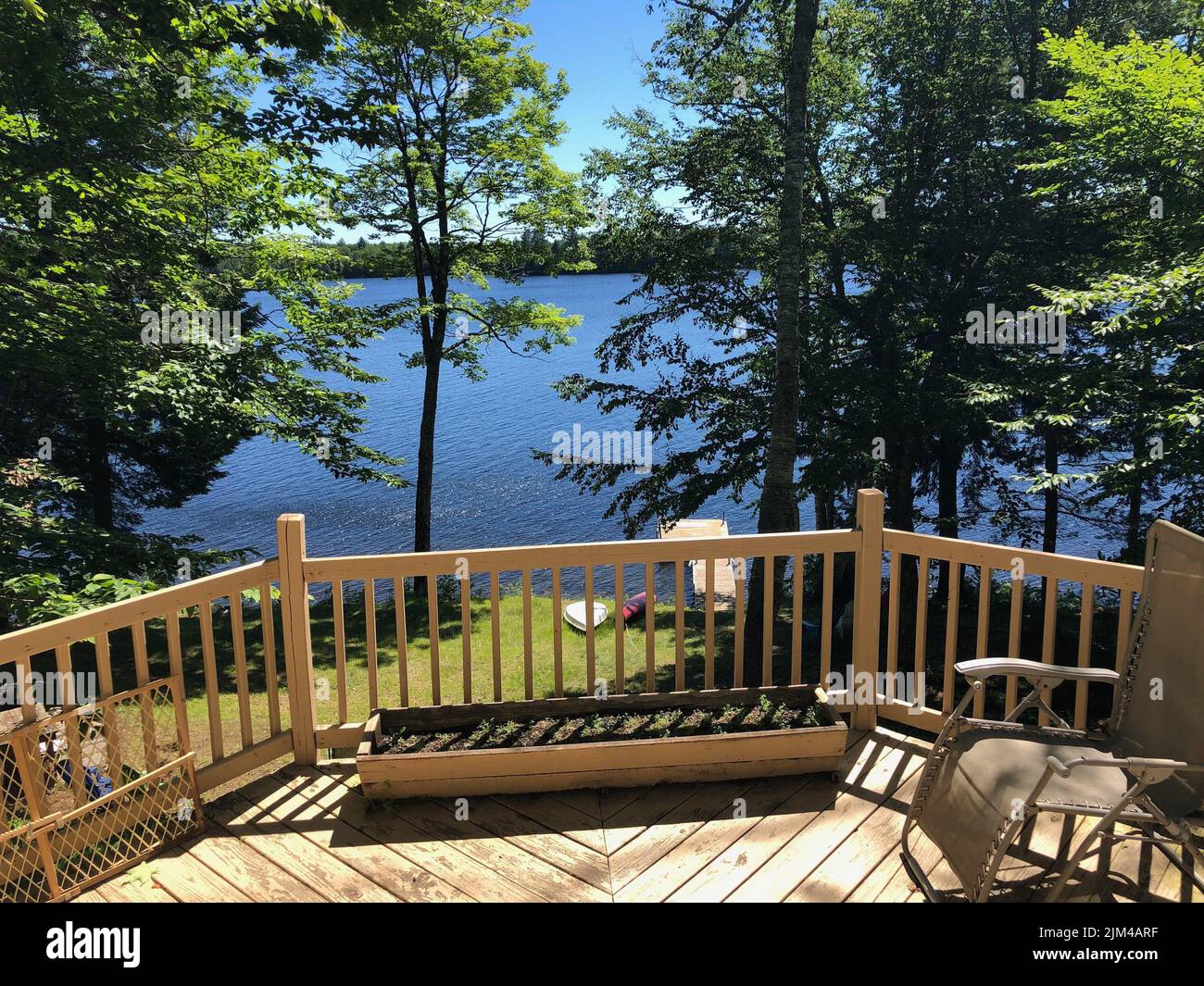 An aerial view of a beautiful lake surrounded by trees Stock Photo - Alamy