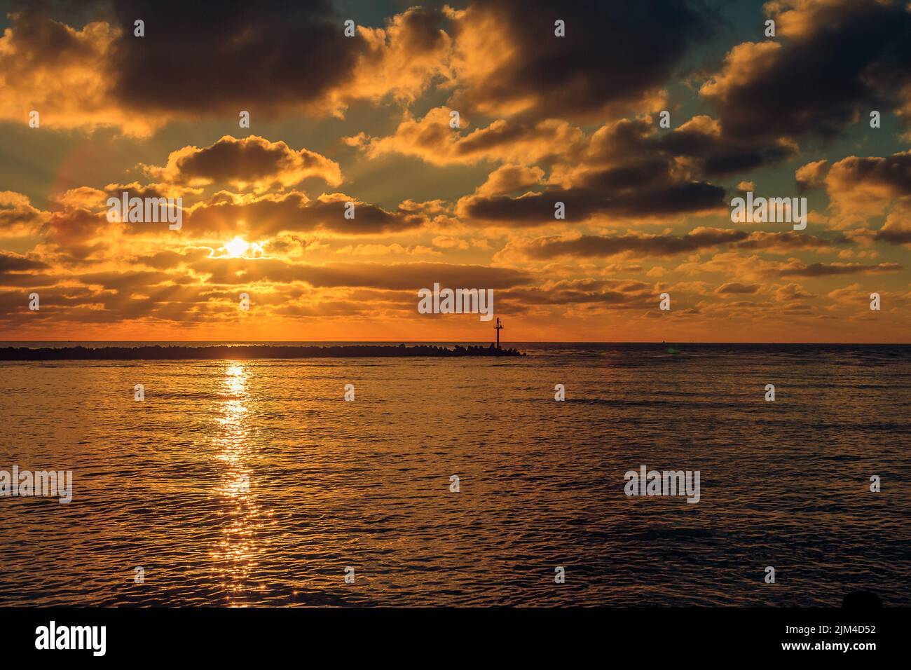 Colorful sunset at the gates to the port of Klaipeda, Lithuania Stock ...