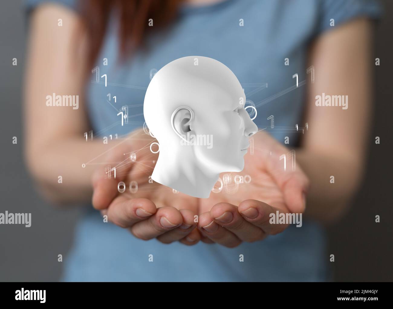 A person presenting a 3D rendered human head with a network plexus ...