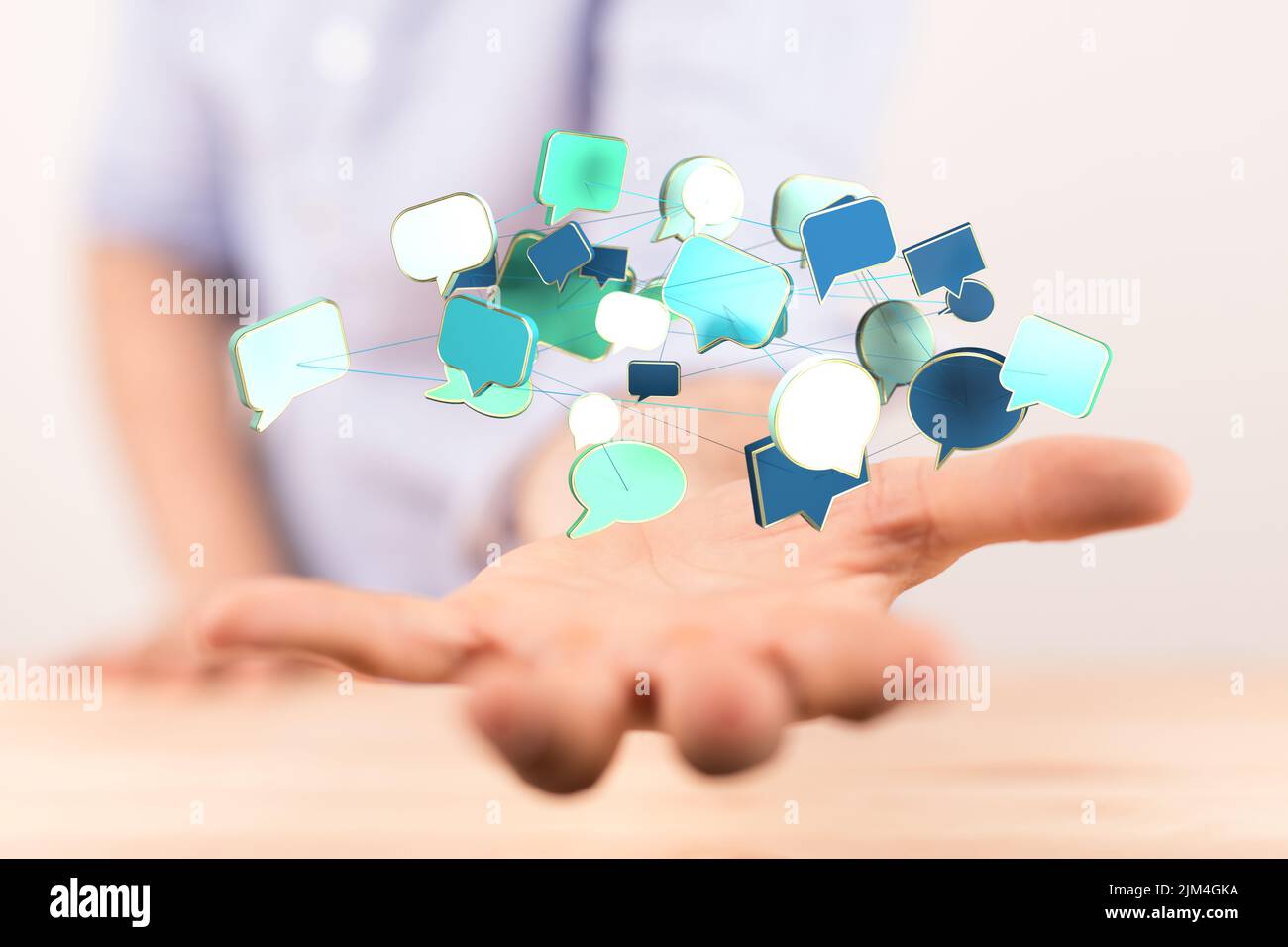 A man's hand holding floating online mailing symbols- communication and ...