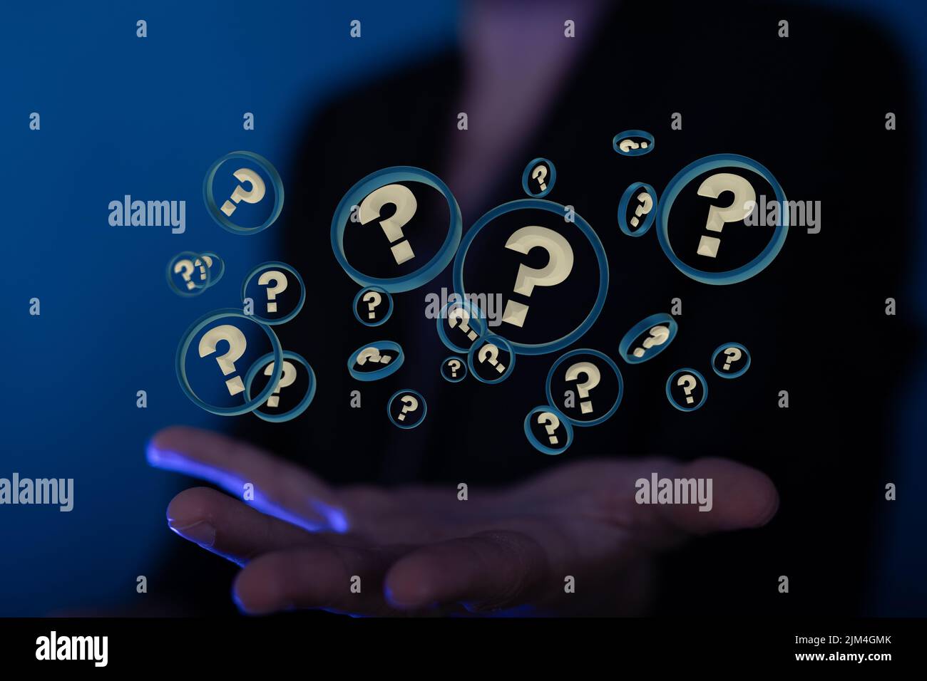A person presenting the 3D rendered question marks Stock Photo - Alamy