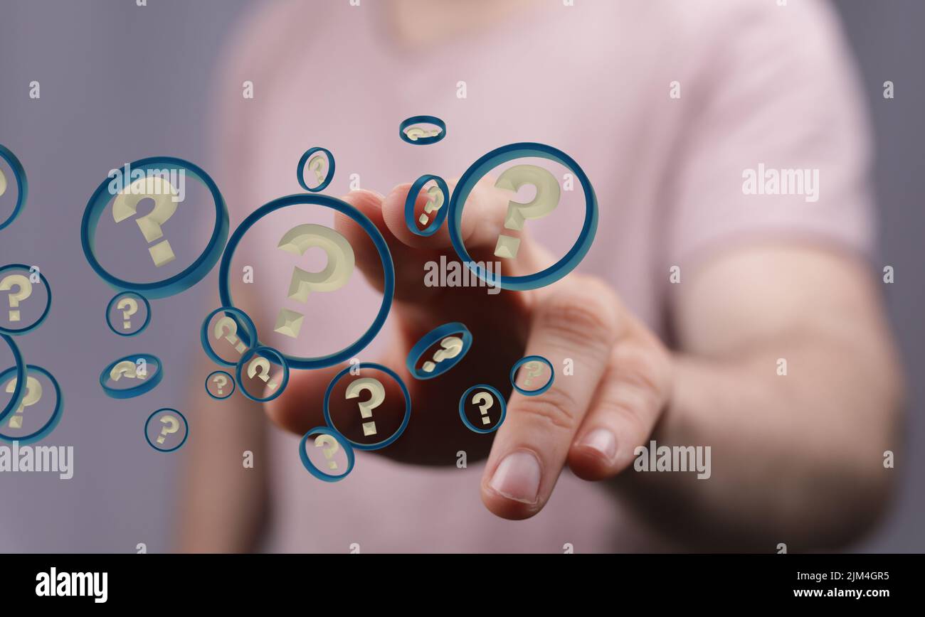 A hand pointing to the 3D rendered question marks Stock Photo - Alamy