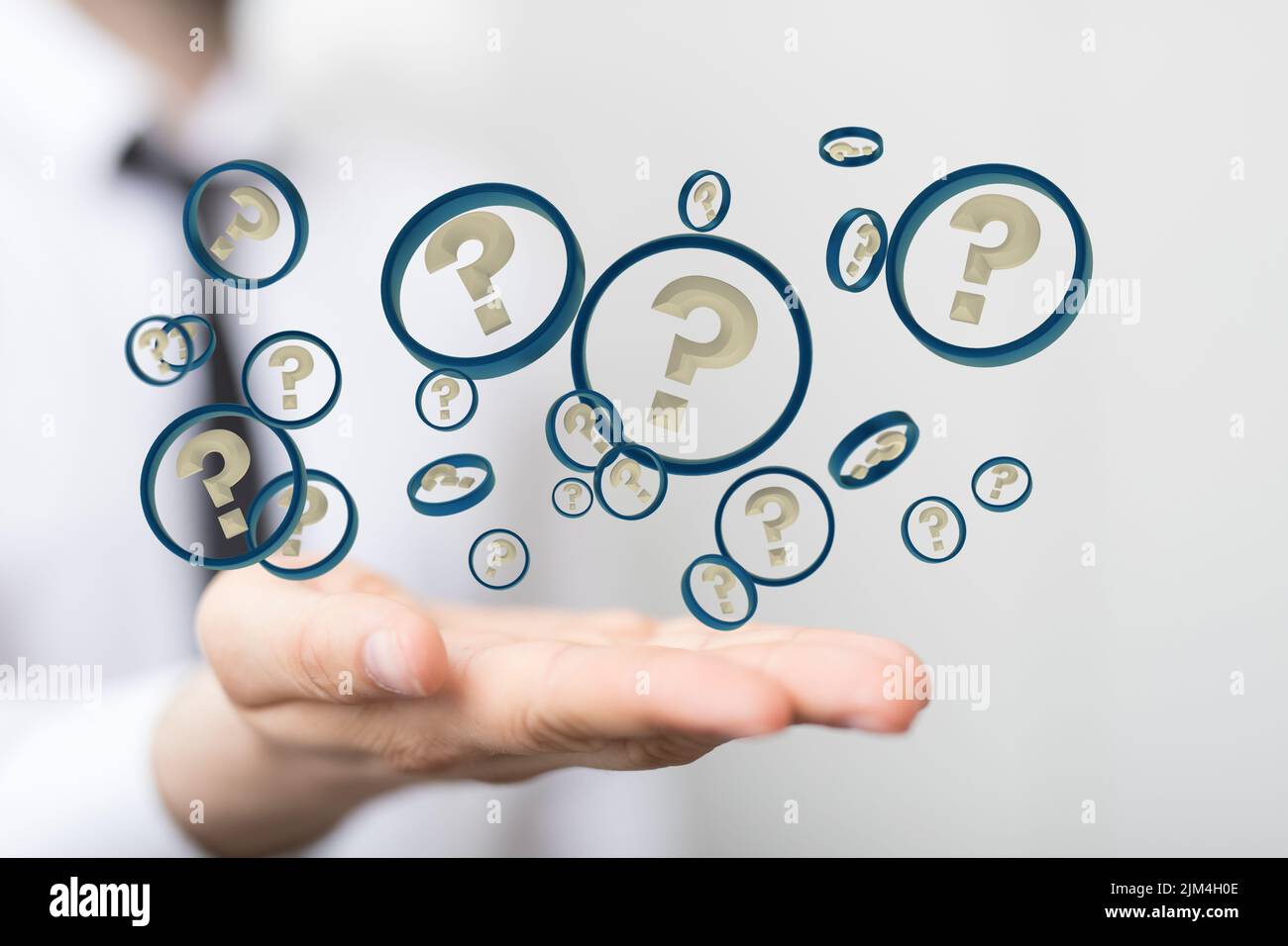 A person presenting a virtual projection of question marks Stock Photo ...