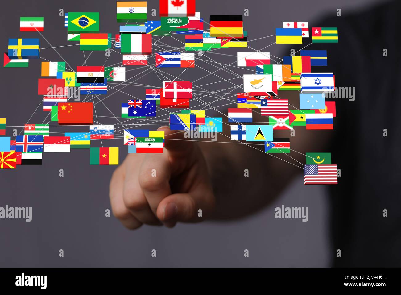 A closeup of illustrated world flags near a hand Stock Photo - Alamy