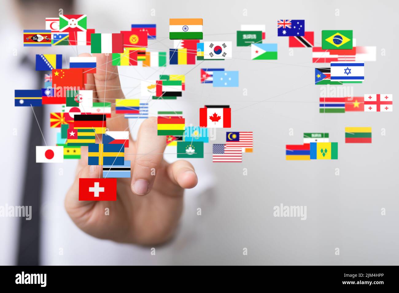 A closeup of illustrated world flags near a hand Stock Photo - Alamy
