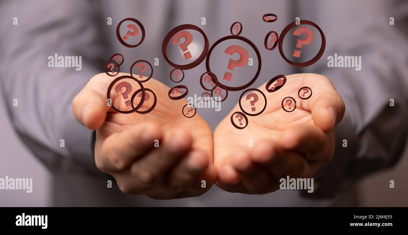 Many question marks in hand hi-res stock photography and images - Alamy