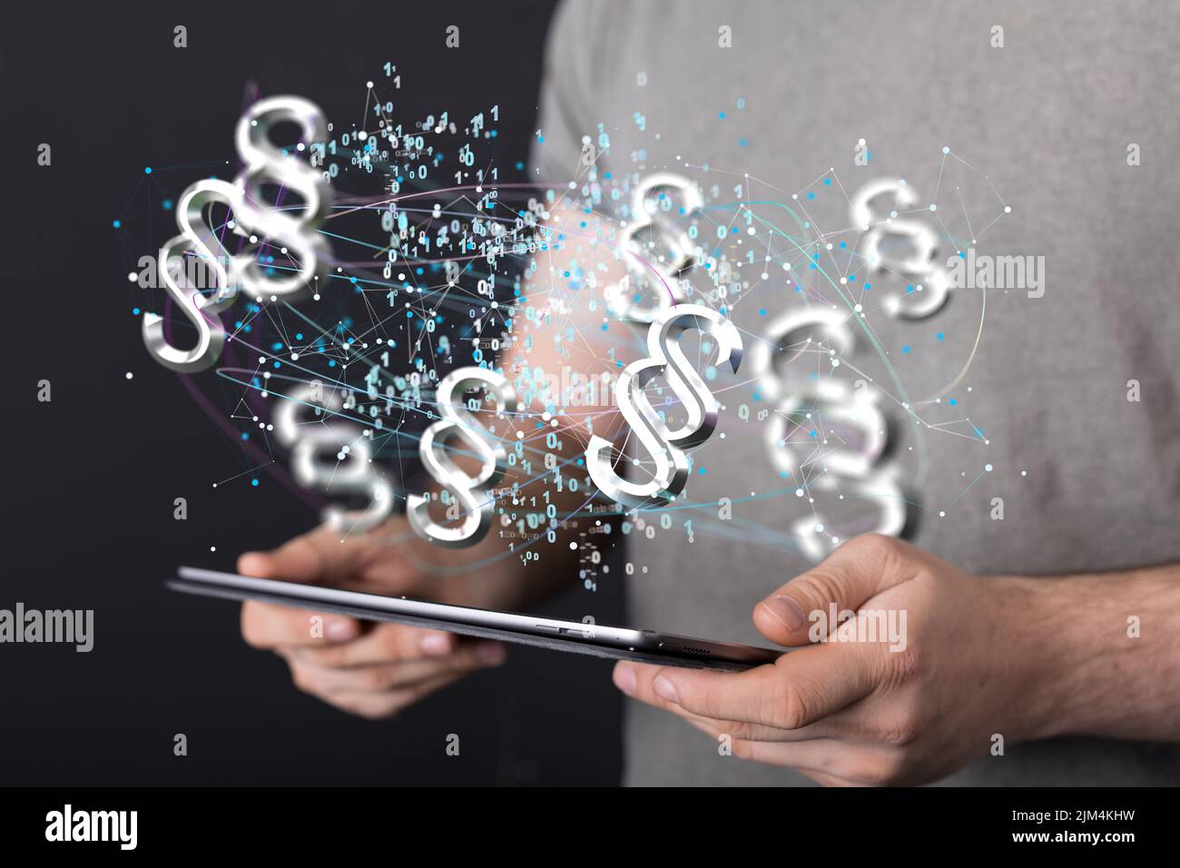 The 3D rendered paragraph law symbols with binary digits over a person's hands holding a tablet ...
