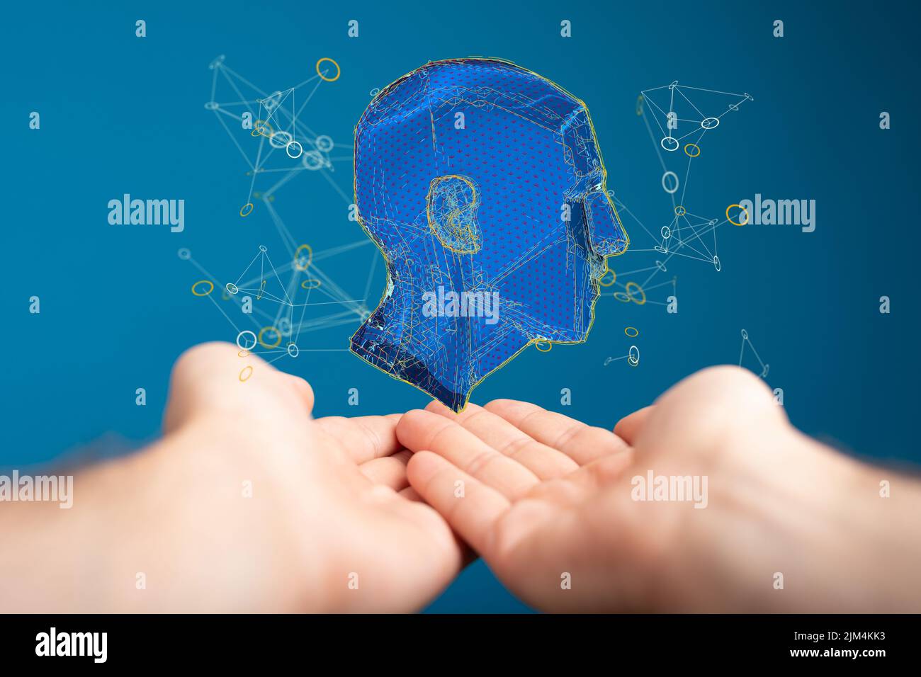 A hologram of a 3D rendered human head hovering over a person's hand - AI concept Stock Photo ...