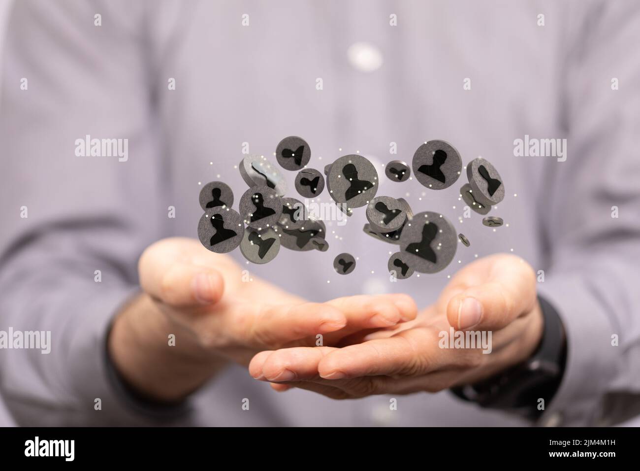 A 3D rendering of profile icons levitating above a person's hands Stock ...