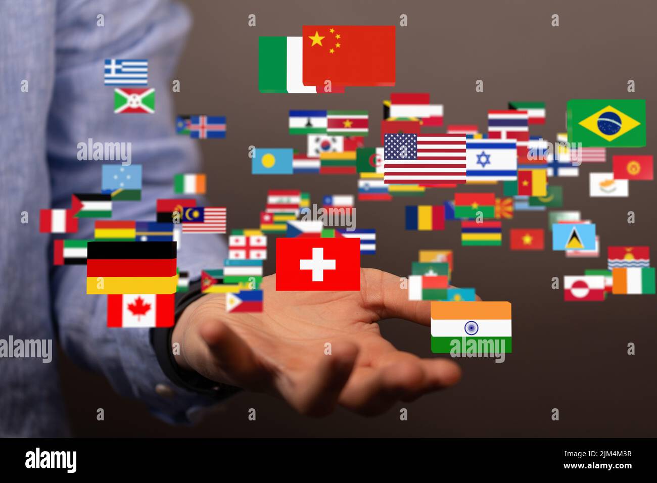 A 3D rendering of multiple flags levitating in the air above a person's ...