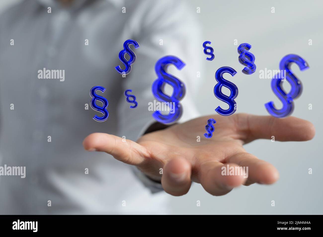 A person's hand with illustrative paragraph icons floating above a hand ...