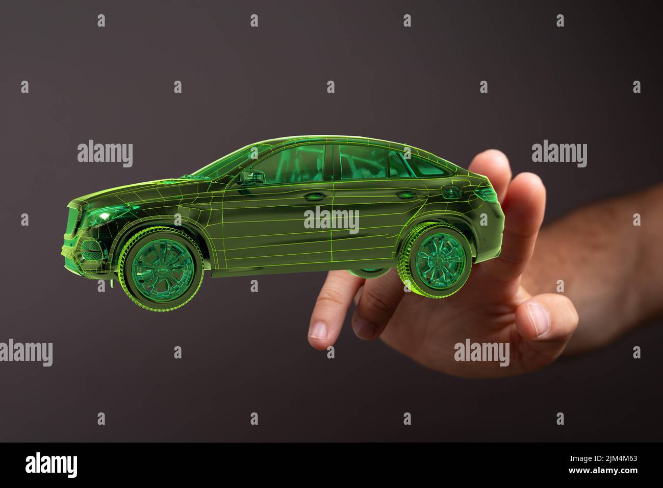 A man presenting a 3D rendering of a holographic smart car Stock Photo ...