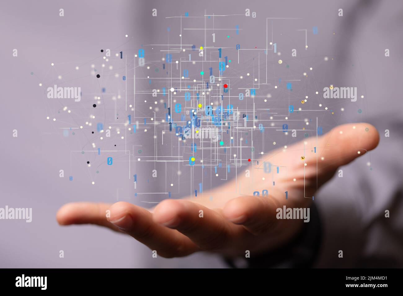 A man holding a floating 3D rendering of futuristic digital cyberspace ...