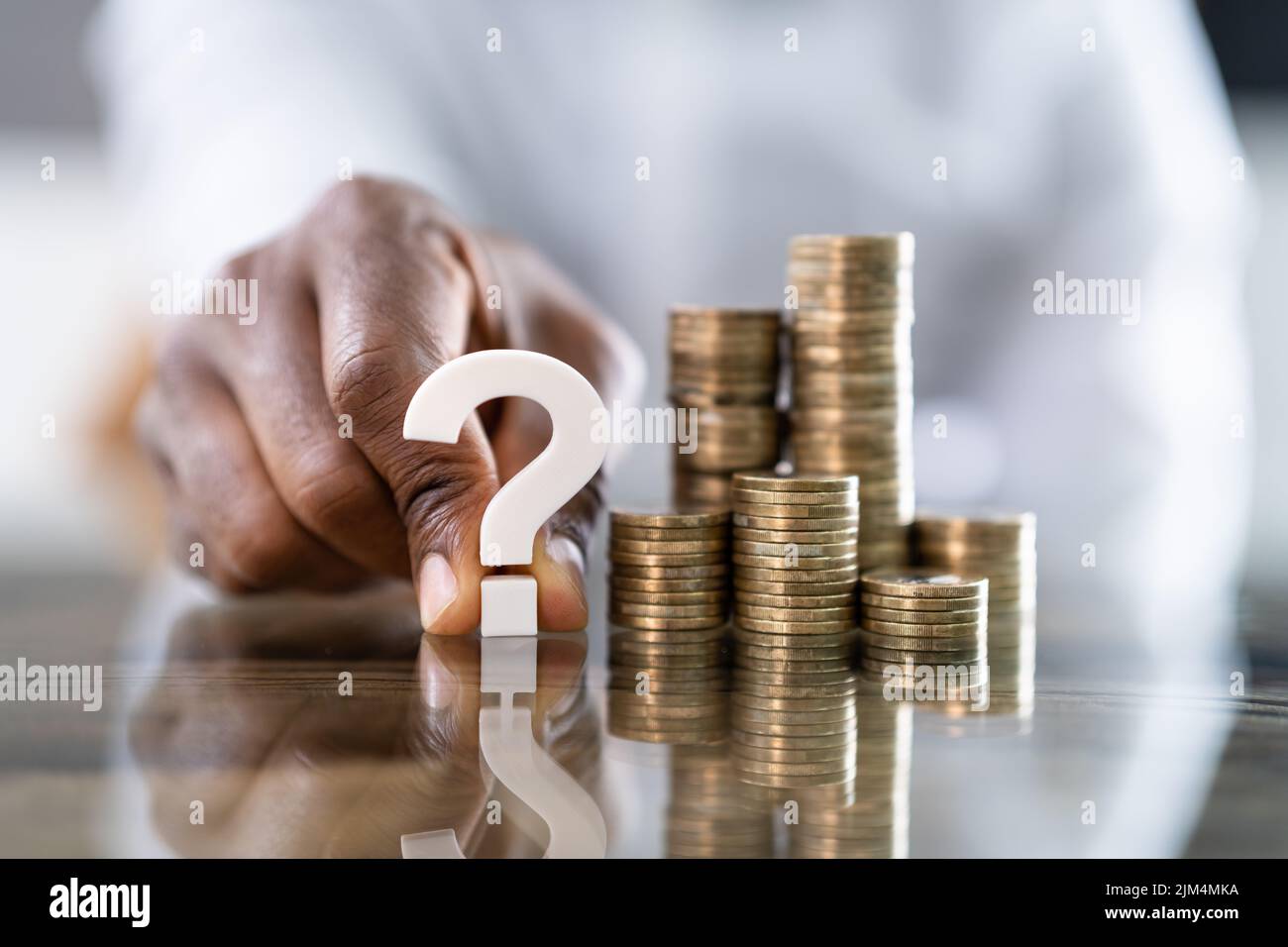 Coin question mark hi-res stock photography and images - Alamy