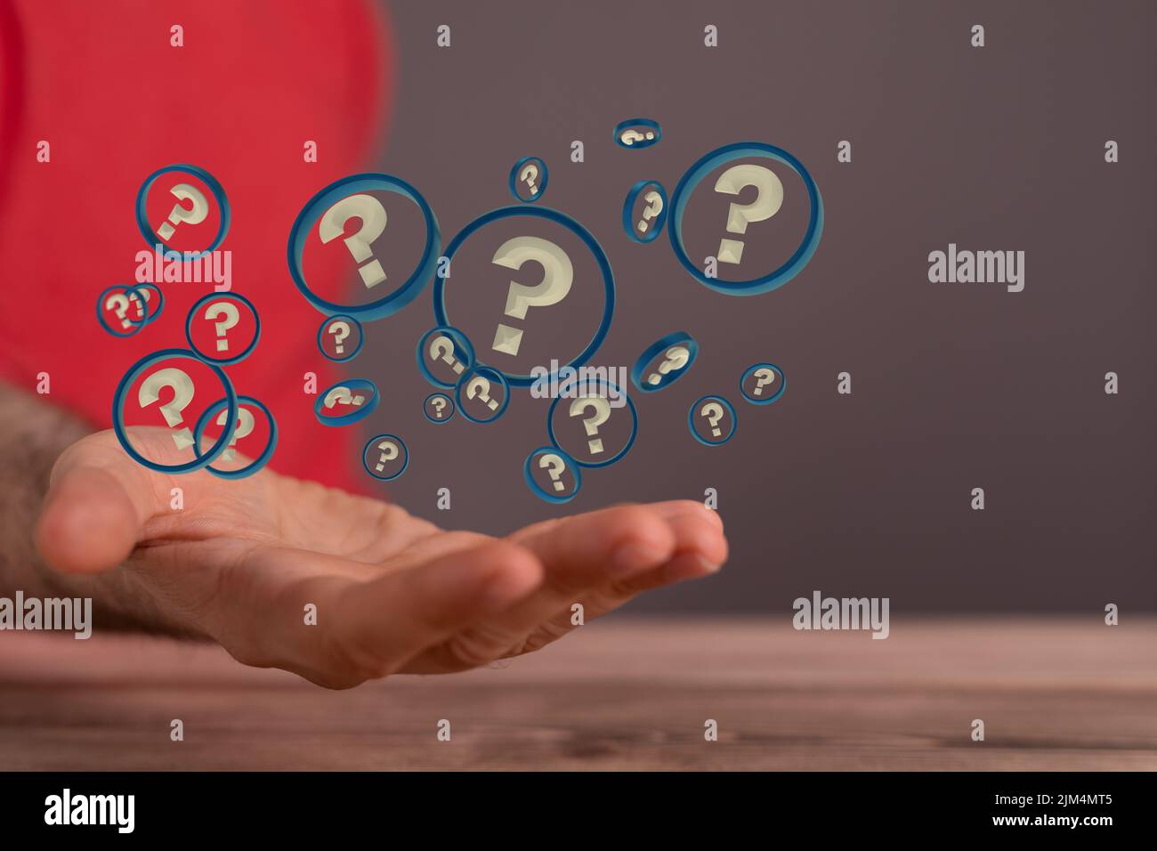 A man presenting 3D rendered question marks Stock Photo - Alamy