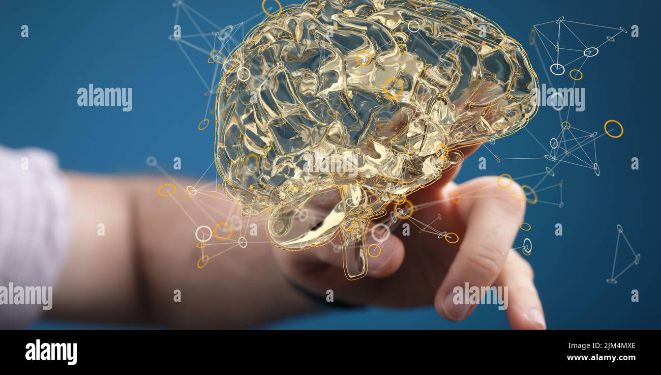 A closeup of a hand pointing at a 3D model of an artificial brain on a ...