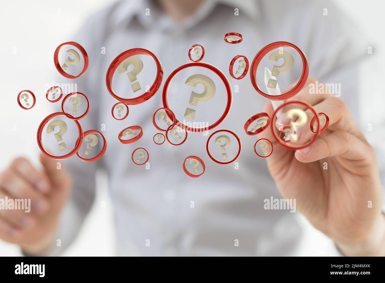 A man's hand with a pencil pointing at a 3D rendering of floating question icons in red circles ...