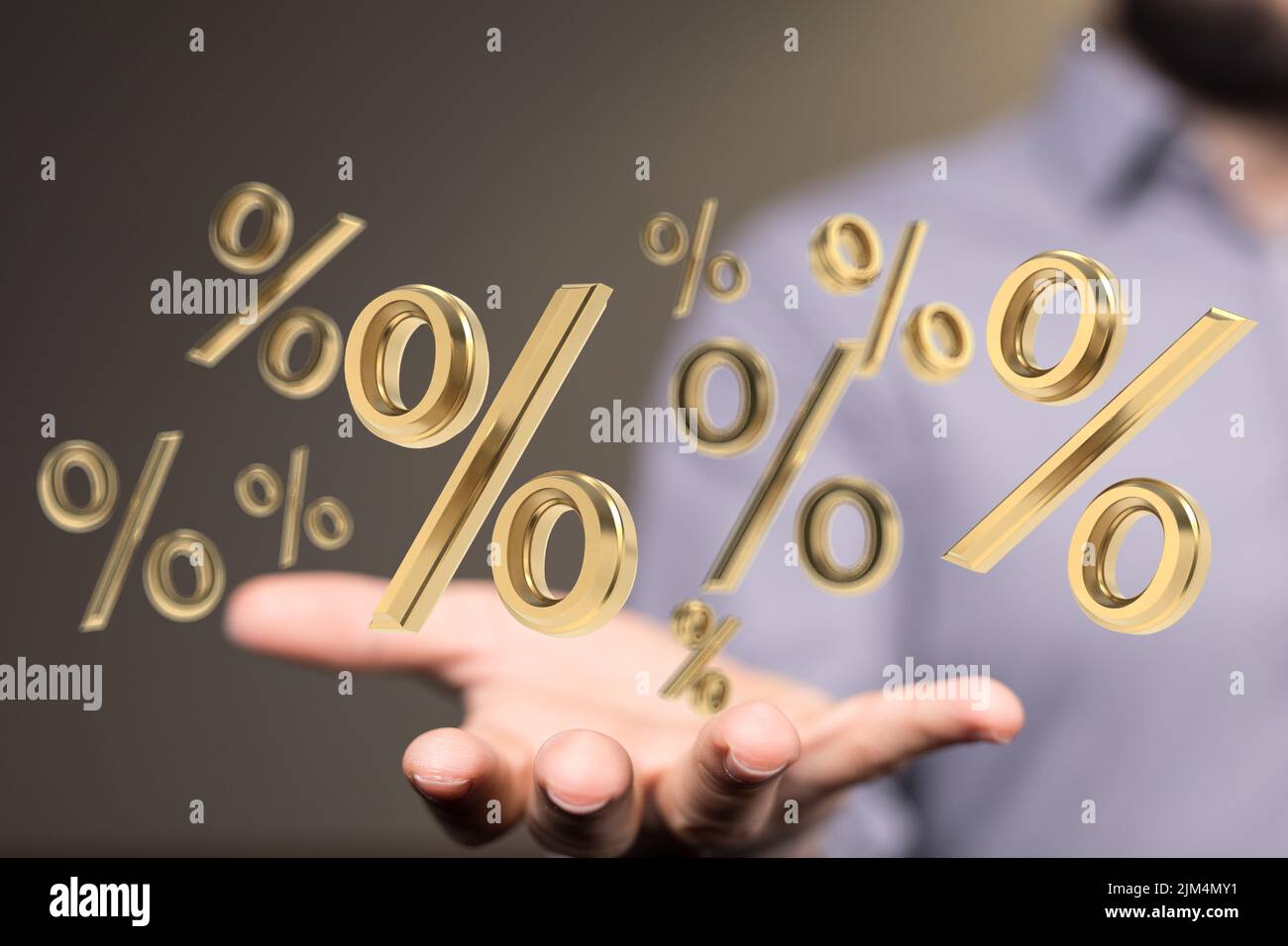 A man presenting 3D rendered percent icons Stock Photo - Alamy