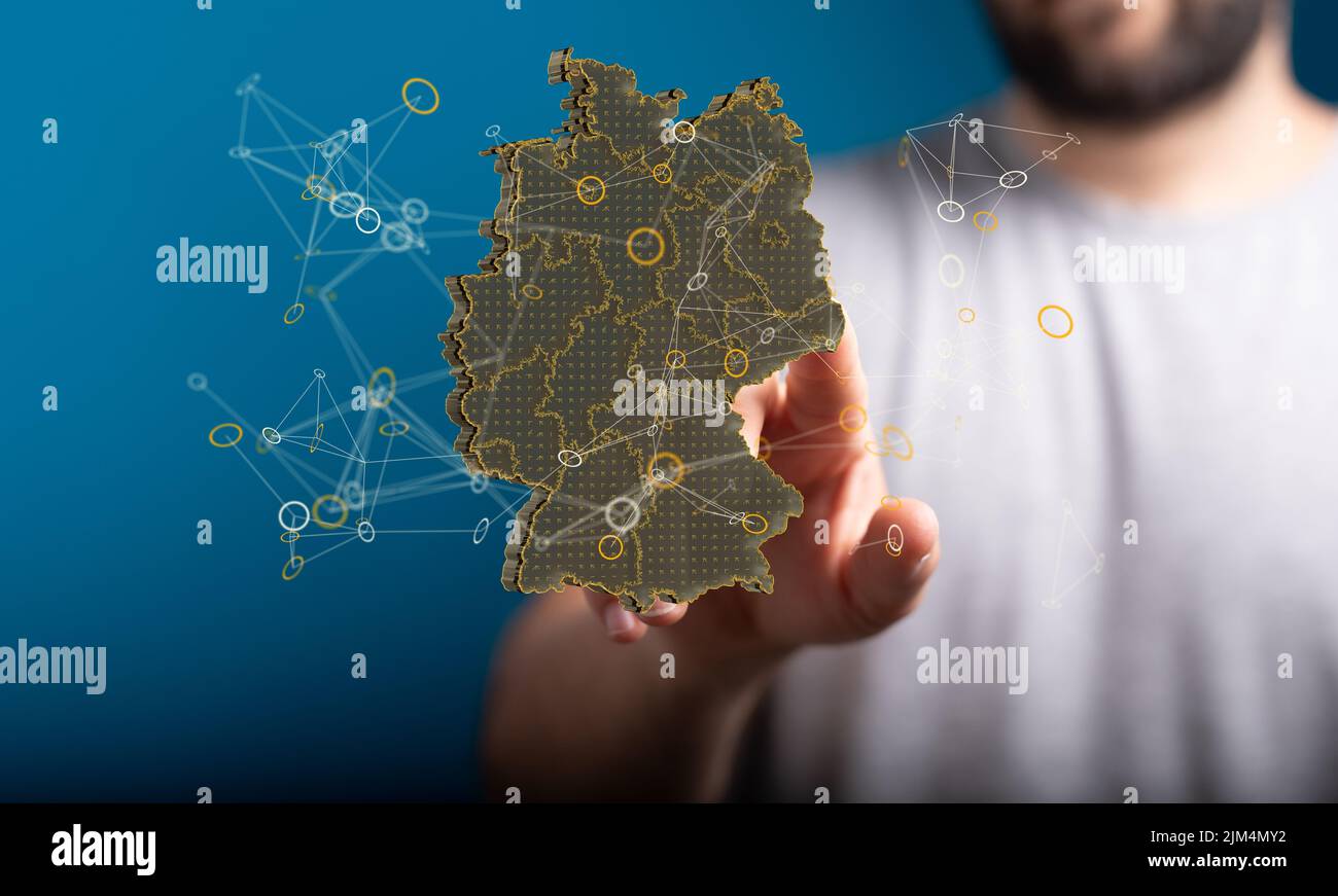 A man pointing the 3D rendered Germany map network, internet and global ...