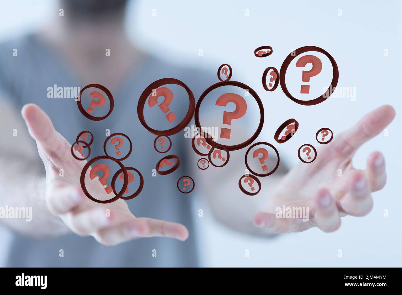 A businessman hand on blurred background using 3D rendering question mark icons Stock Photo - Alamy