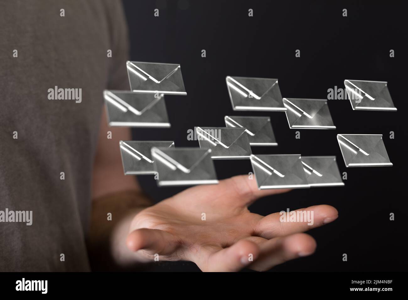 A 3D render of an email symbol and Network Communications with male ...