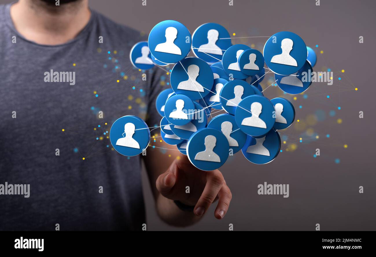 A closeup of illustrated people icons near a hand Stock Photo - Alamy