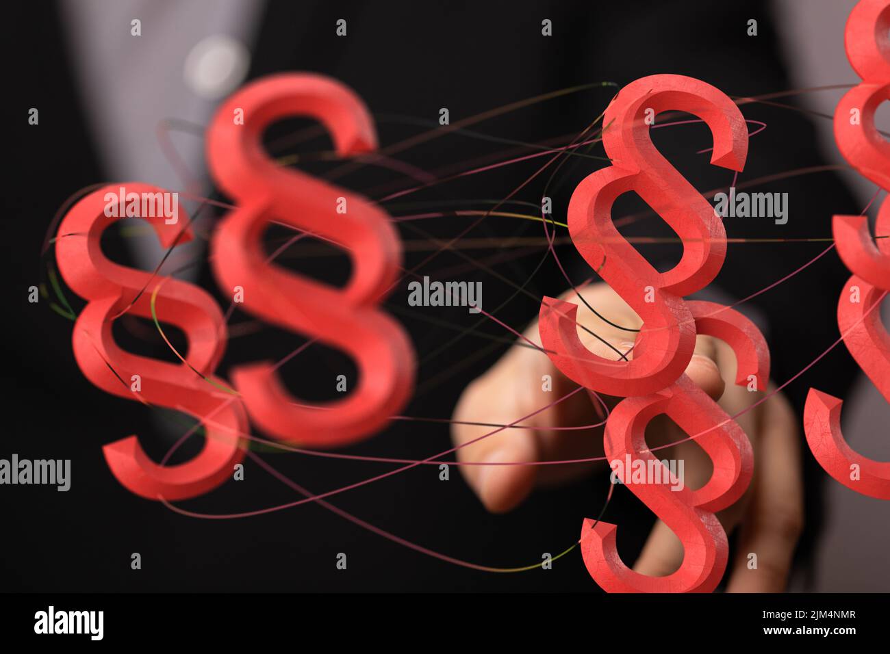 A male's hands pointing to an illustrated law paragraphs - Law and ...