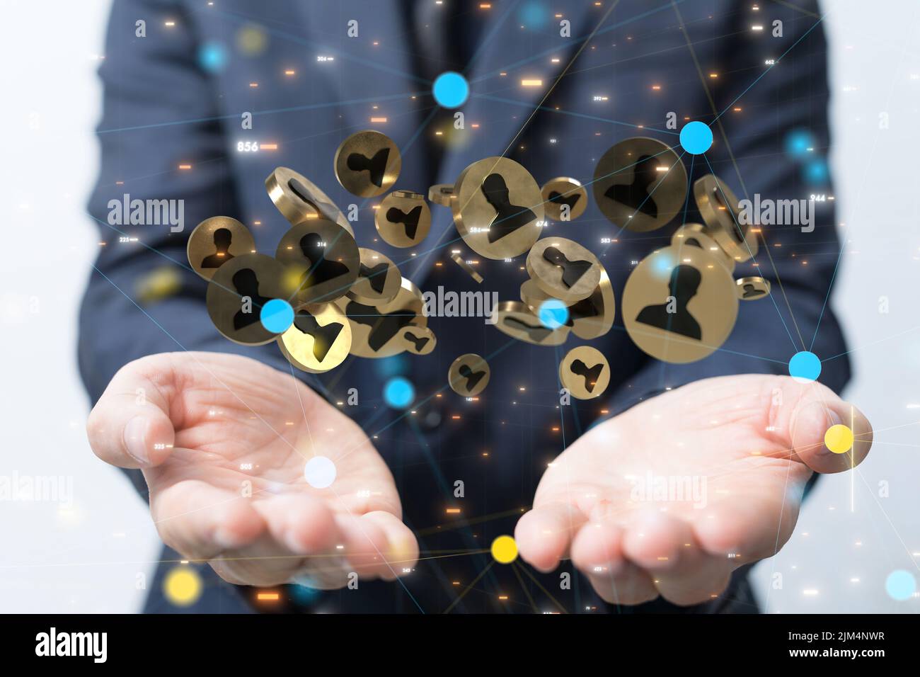 A closeup of illustrated people icons near a hand Stock Photo - Alamy