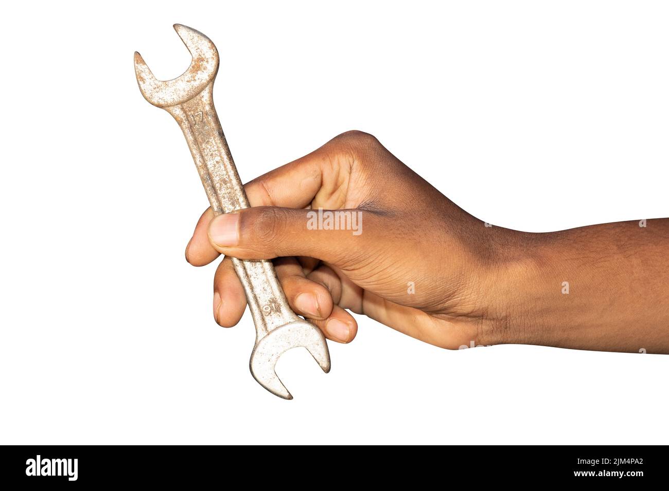 Hand of car mechanic with a wrench. Isolated over white background ...