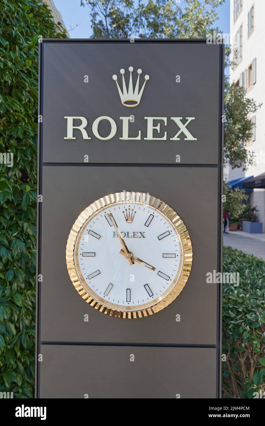 Rolex signboard stand with a large watch in a Porto Montenegro Stock ...