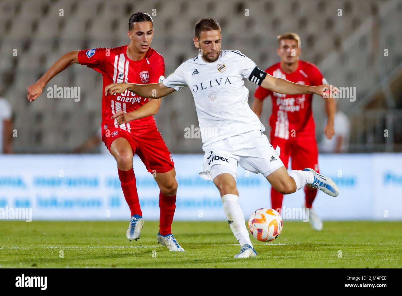 BELGRADE, SERBIA - AUGUST 4: Ramiz Zerrouki of FC Twente, Marko Docic ...