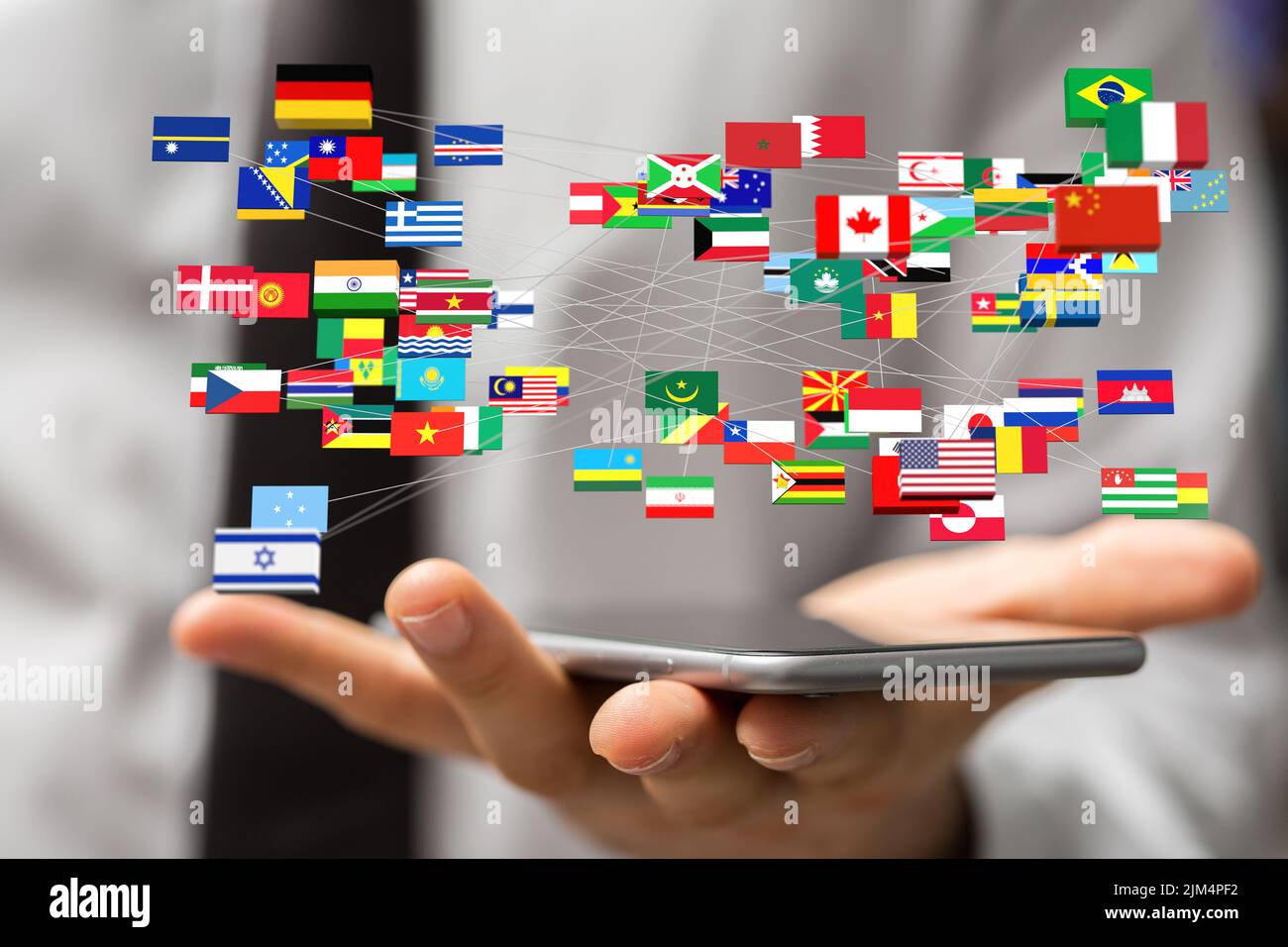 A closeup of illustrated world flags near a hand Stock Photo - Alamy