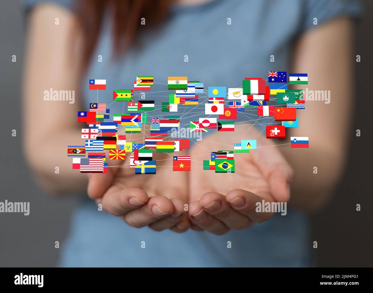 A closeup of illustrated world flags near a hand Stock Photo - Alamy