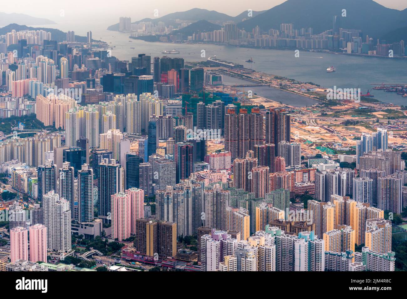 An aerial view of the skyline of the city of Hong Kong and mountains on ...