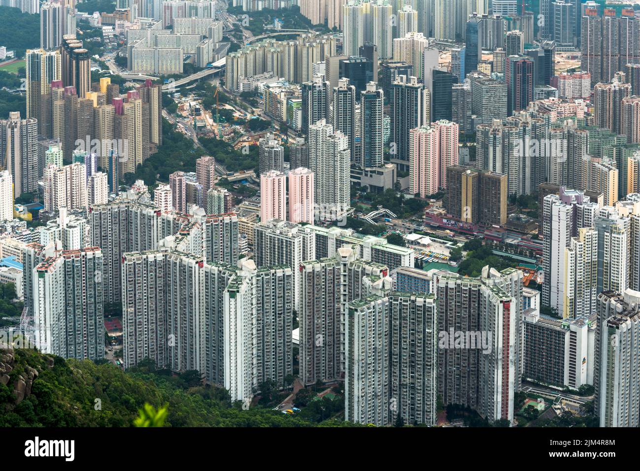 The view of the Kowloon walled city from Lion Rock hill under a stormy ...