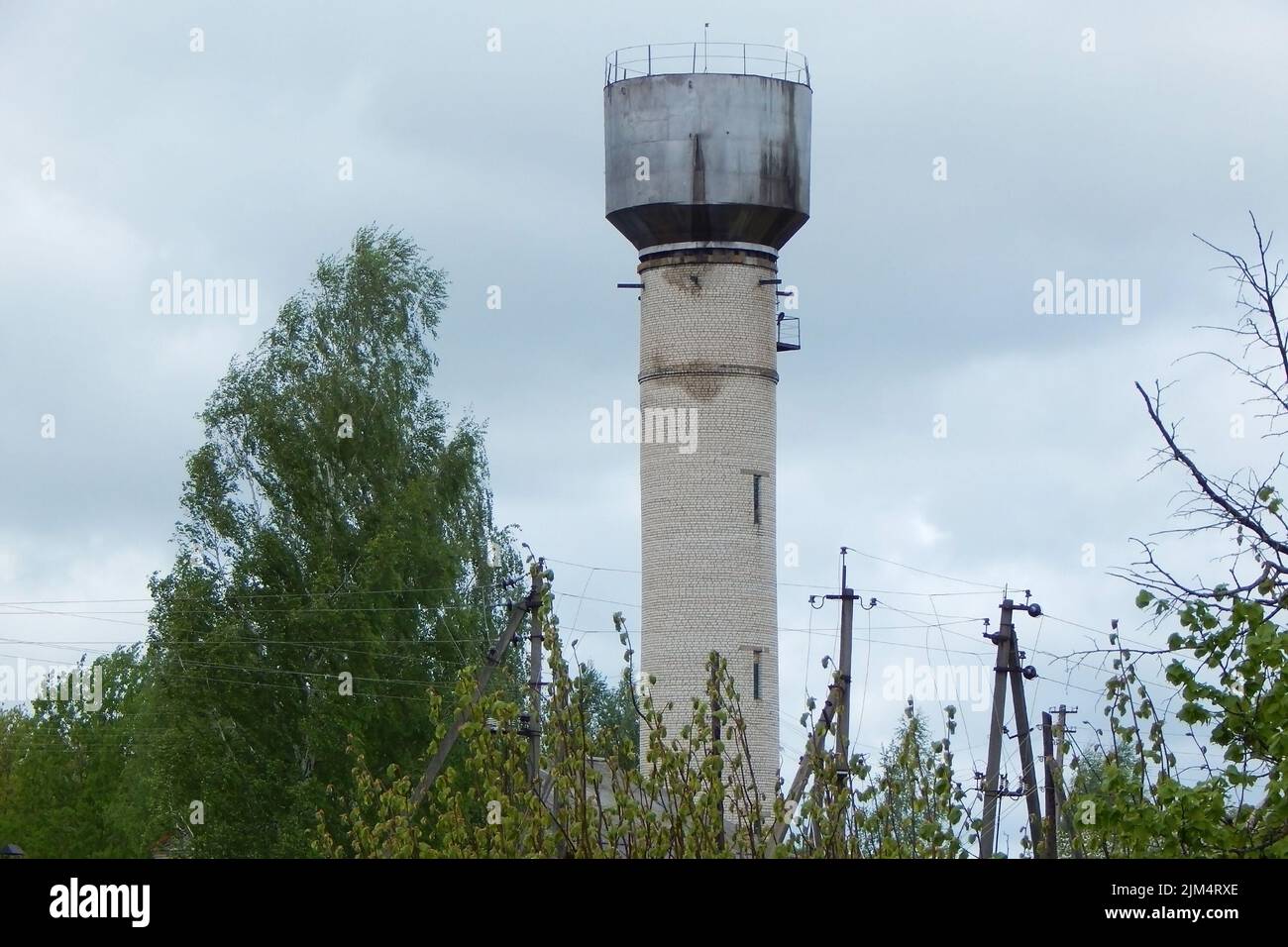 Old brick water tower against the sky. High quality photo Stock Photo ...