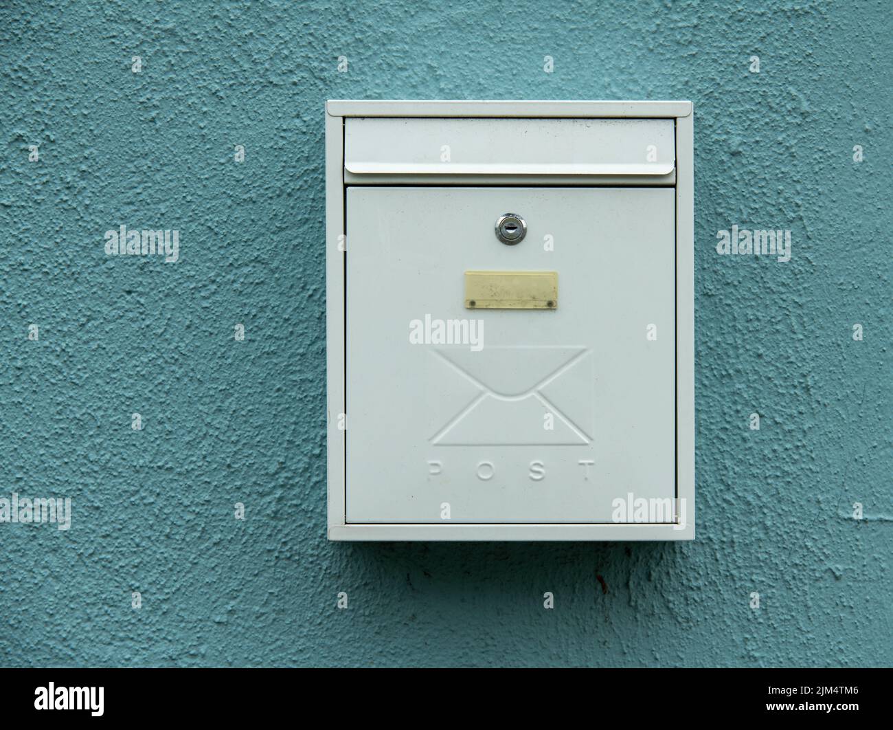 postal letterbox mounted on the outside Stock Photo - Alamy