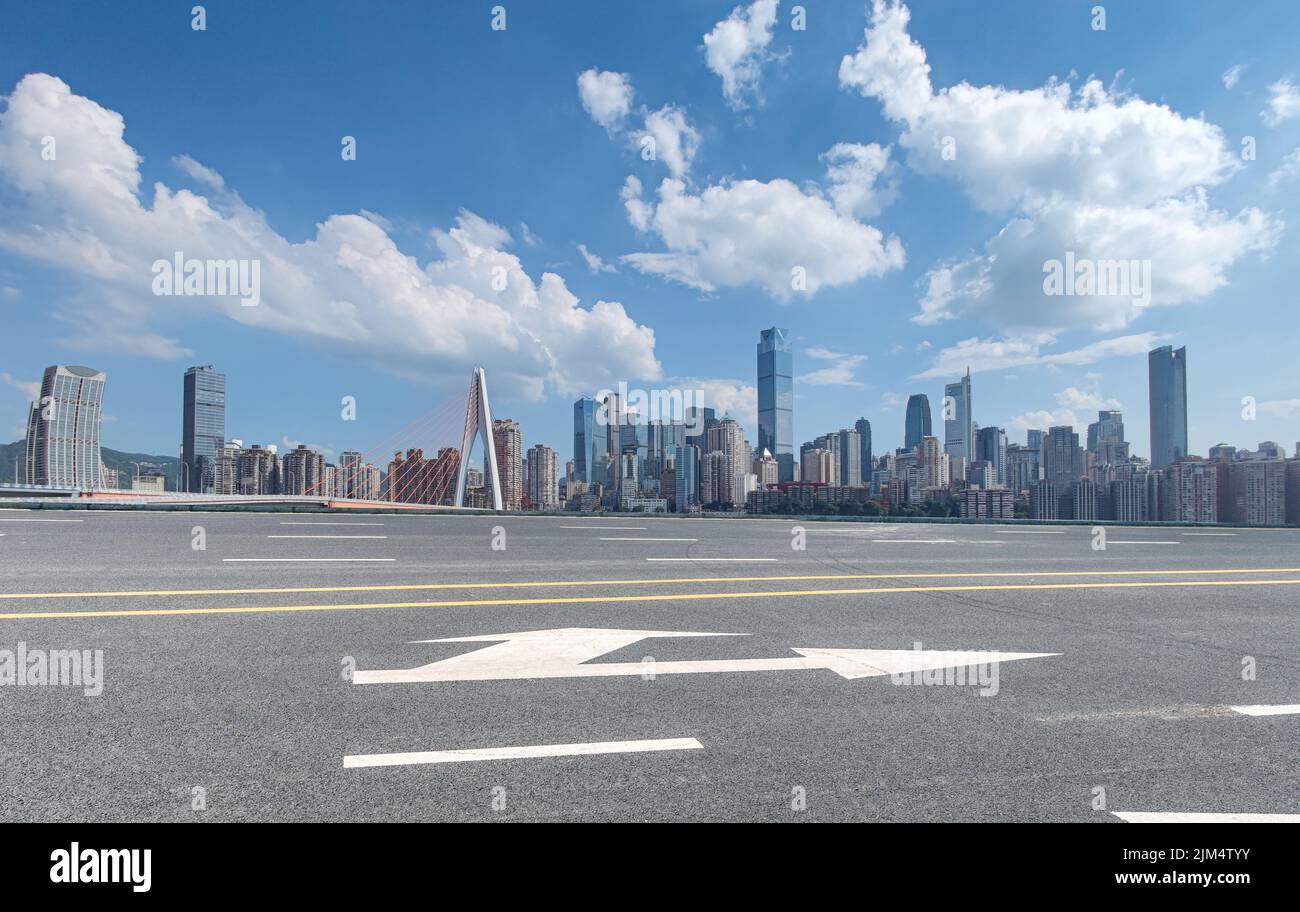 A closeup of a road with buildings in the background Stock Photo - Alamy