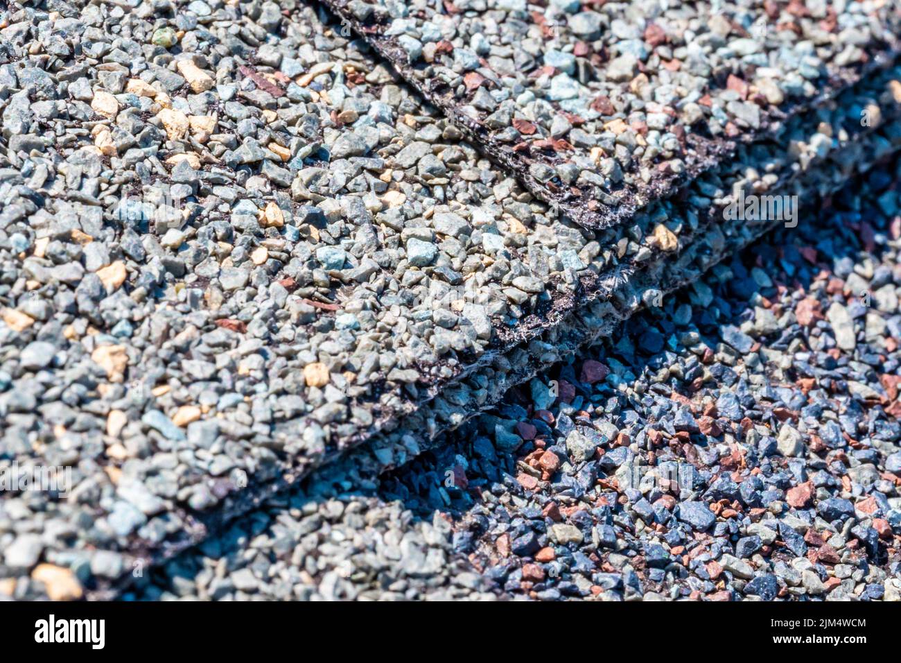 Macro of asphalt shingle layered seam on a residential house Stock ...